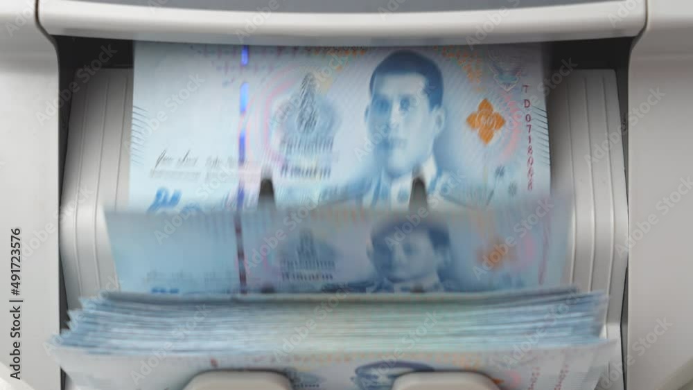 Thai Baht money counting in Machine. Paper THB Thai baht banknotes ...