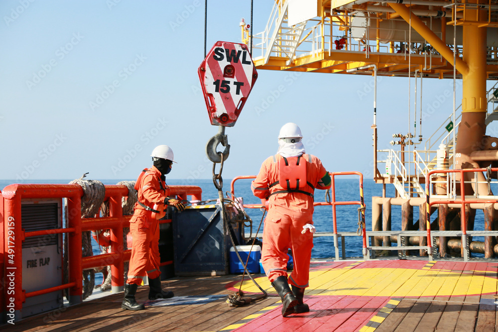 Crews boat moving the passenger and cargo from the platform to supply ...