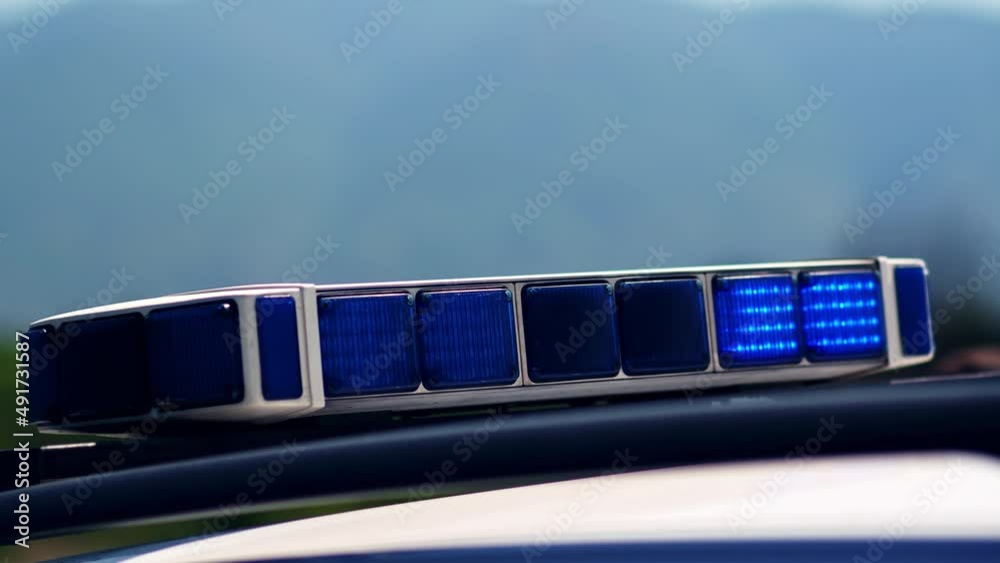 Flashing blue emergency lights. Flashing lights on an ambulance or ...