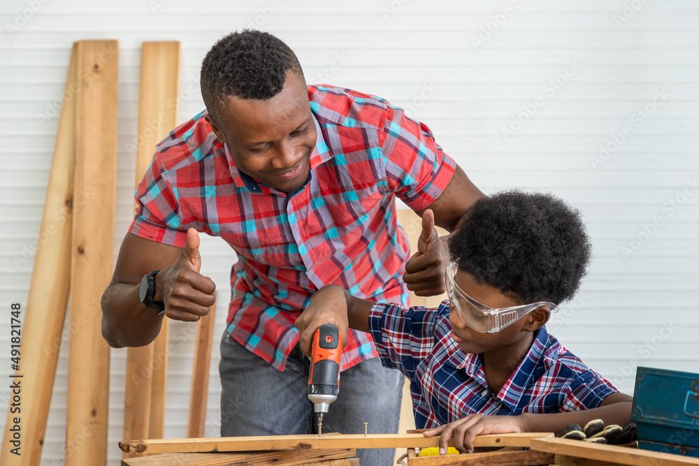 African black male carpenter man father teach boy kid child son to be ...