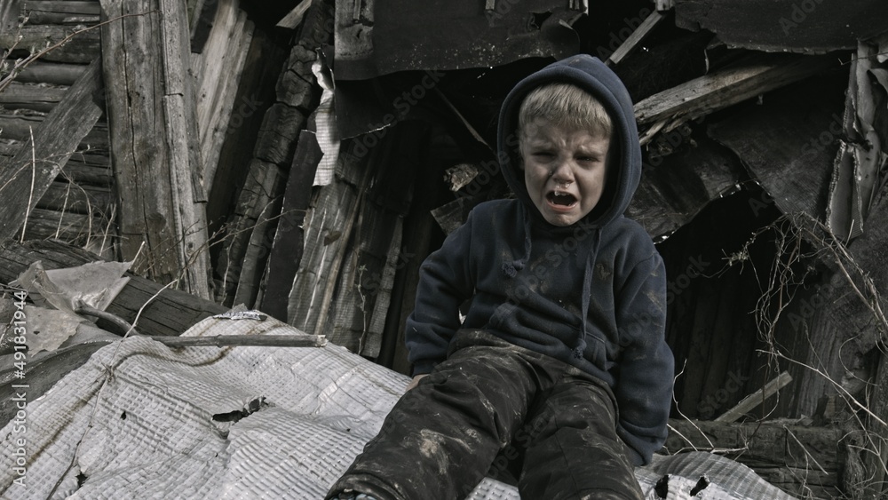 A child is crying in the ruins Stock Photo | Adobe Stock