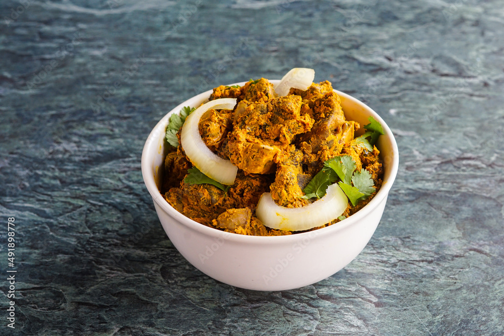 Sauced goat head - Nigerian Isi ewu Stock Photo | Adobe Stock