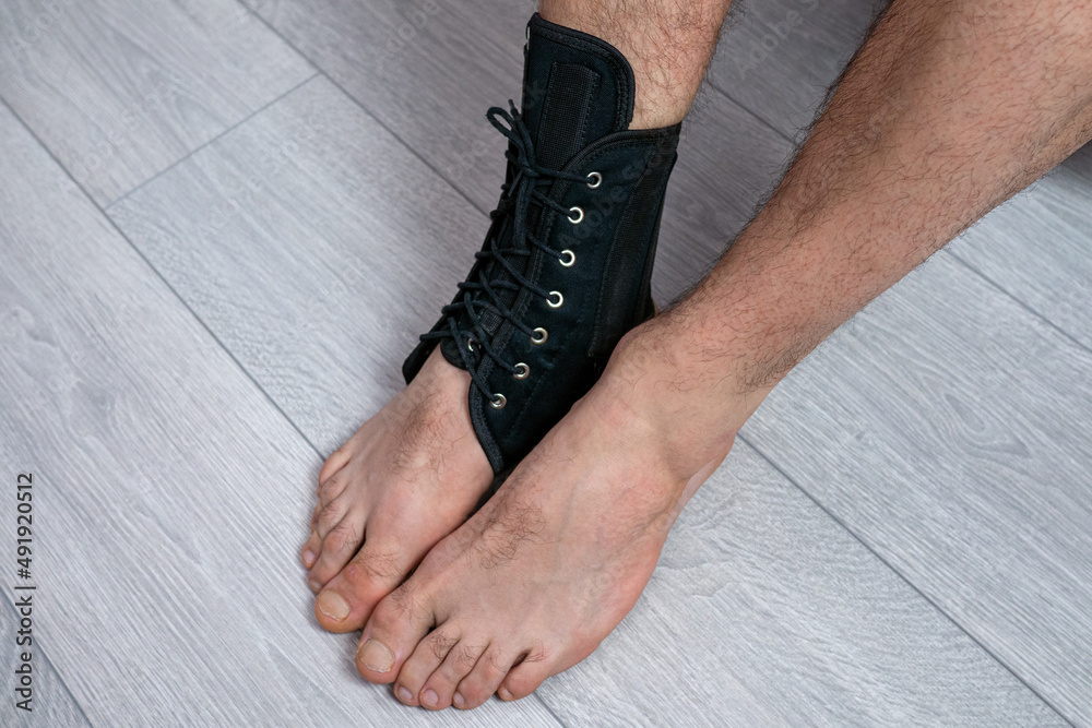 compression fixed in ankle stabilizer medical bandage. Fracture or Leg ...