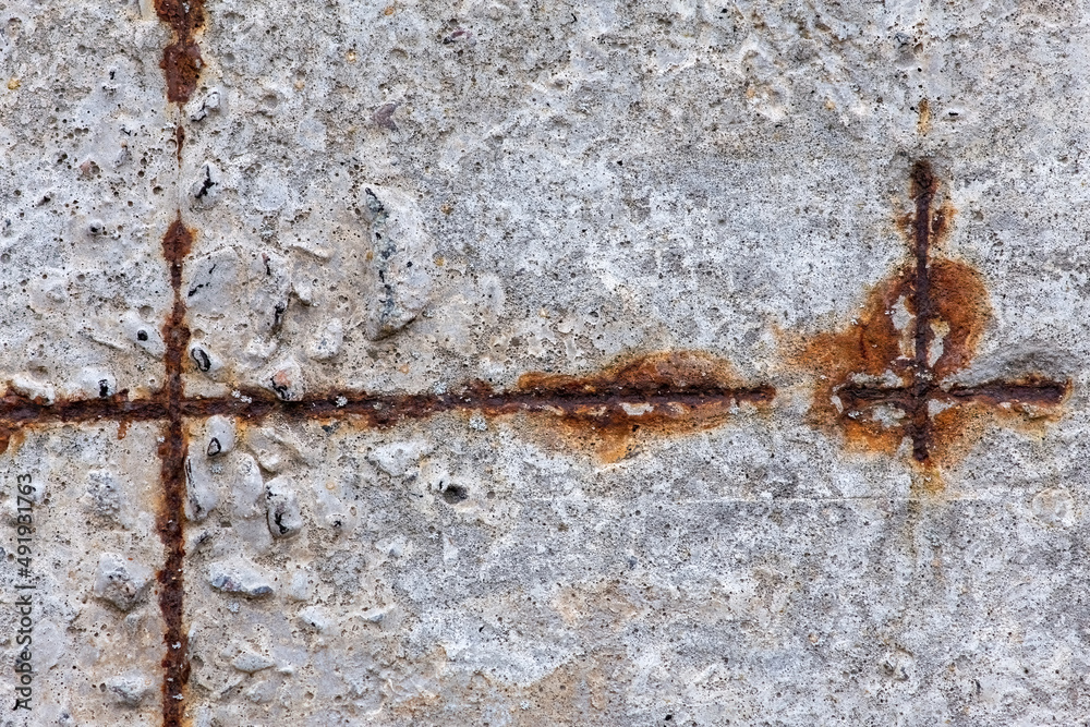 Macro fragment of an old gray concrete wall with rusty rebar. Material ...
