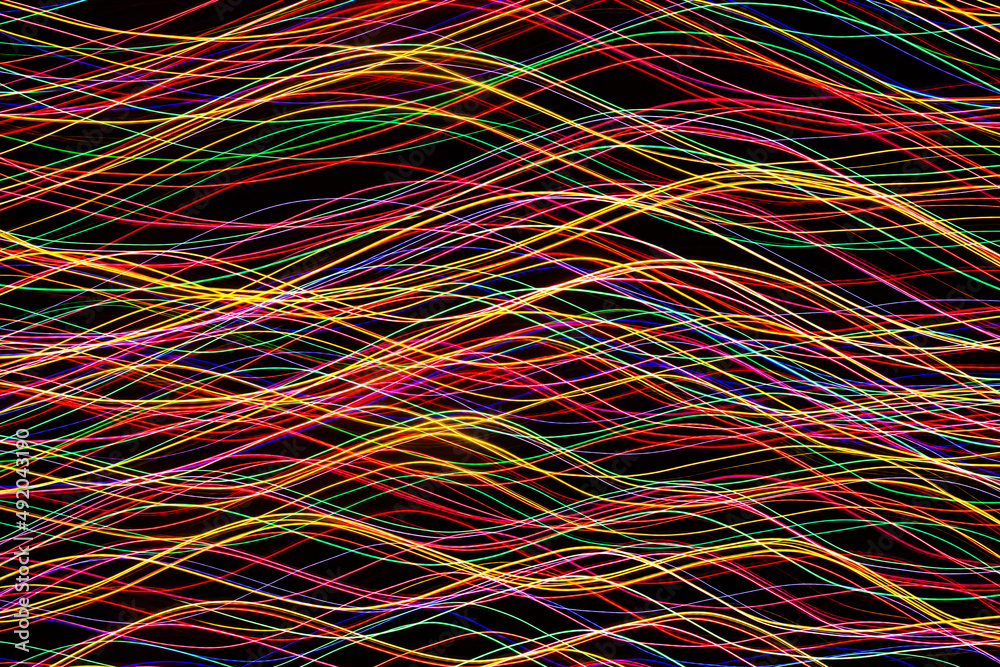 ภาพประกอบสต็อก Sinusoidal wave chaos texture. Neon lights background ...