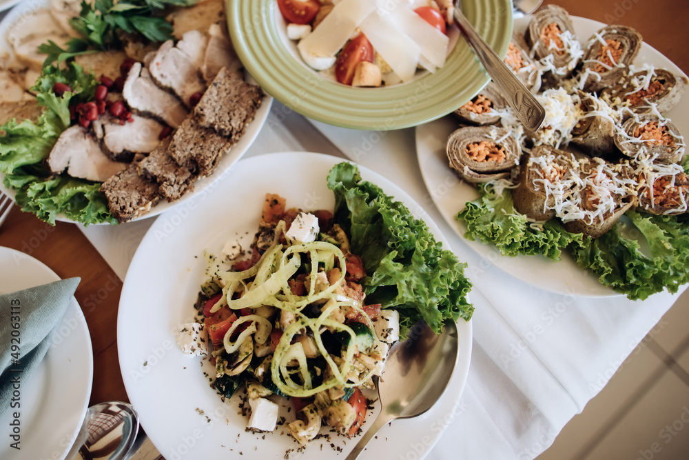 Top view table full of food in restaurant Stock Photo | Adobe Stock