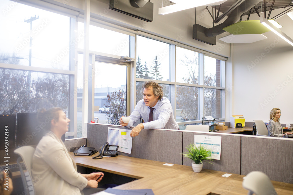 Business people working in open plan office Stock Photo | Adobe Stock