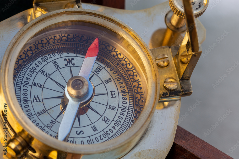 Detail of an antique maritime bronze solar compass Stock Photo | Adobe ...
