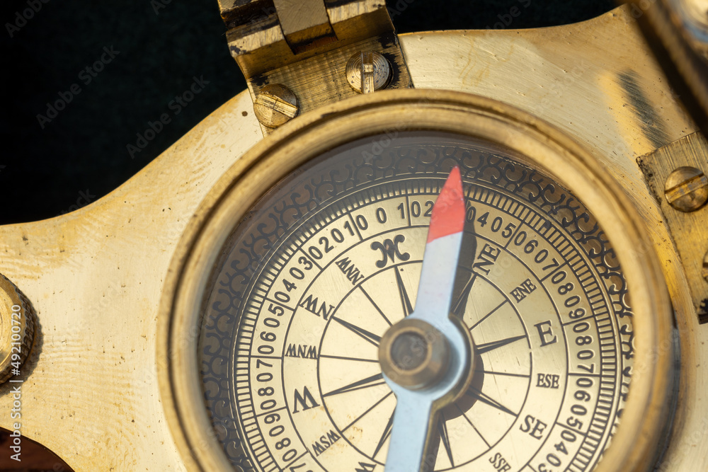 Detail of an antique maritime bronze solar compass Stock Photo | Adobe ...