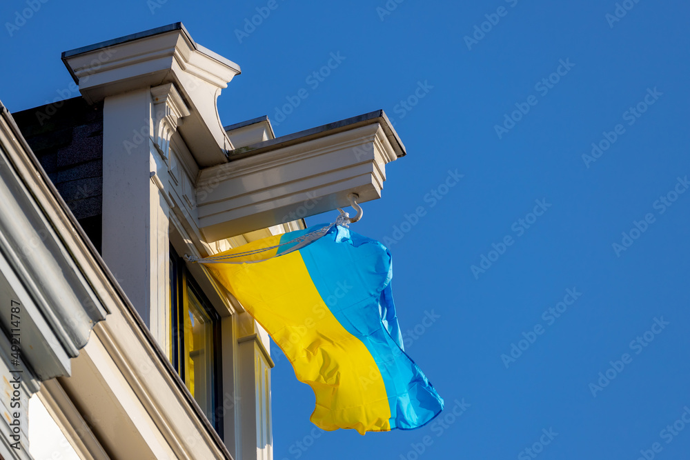 The national flag of Ukraine which has equally sized horizontal bands ...