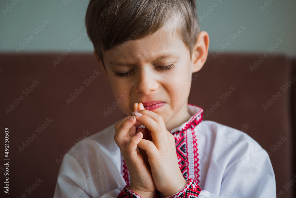 Little boy praying, child praying, with cloused eyes. Stock Photo ...