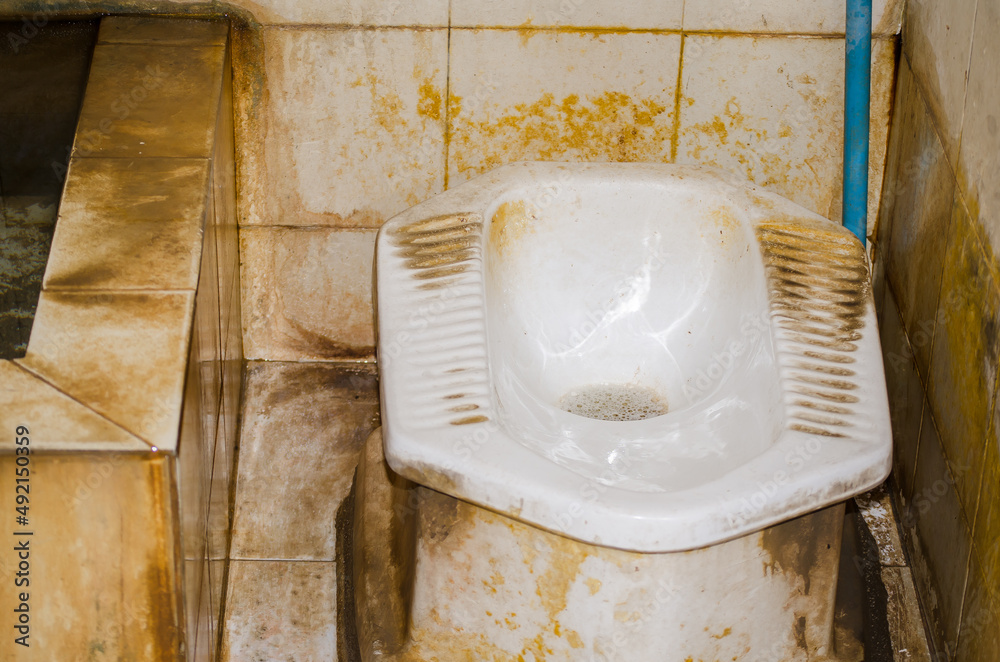 Dirty Squat Toilet, is to place one foot on each side of the toilet ...