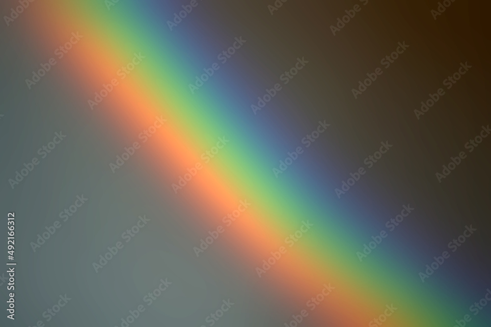 Abstract oblique rainbow blurred background. The phenomenon of visible ...