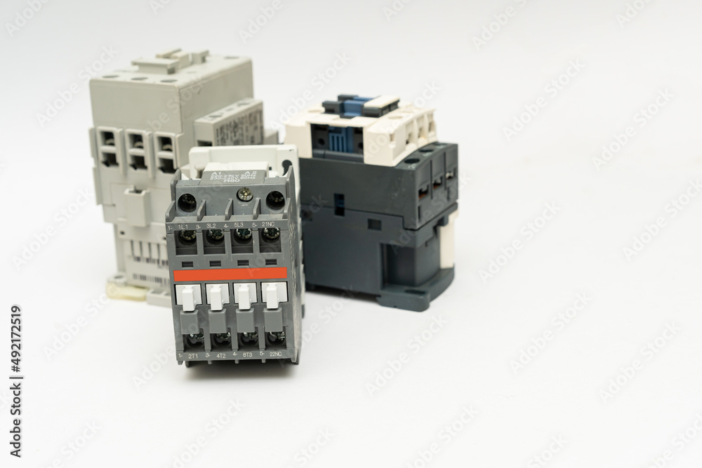 Magnetic contactor with Overload Relay isolate on white background. The ...