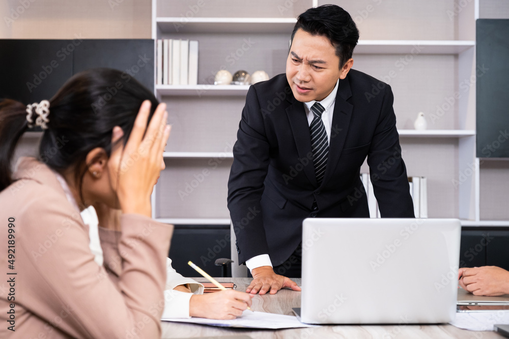 Asian men manager scold and angry with their employee inside of office ...