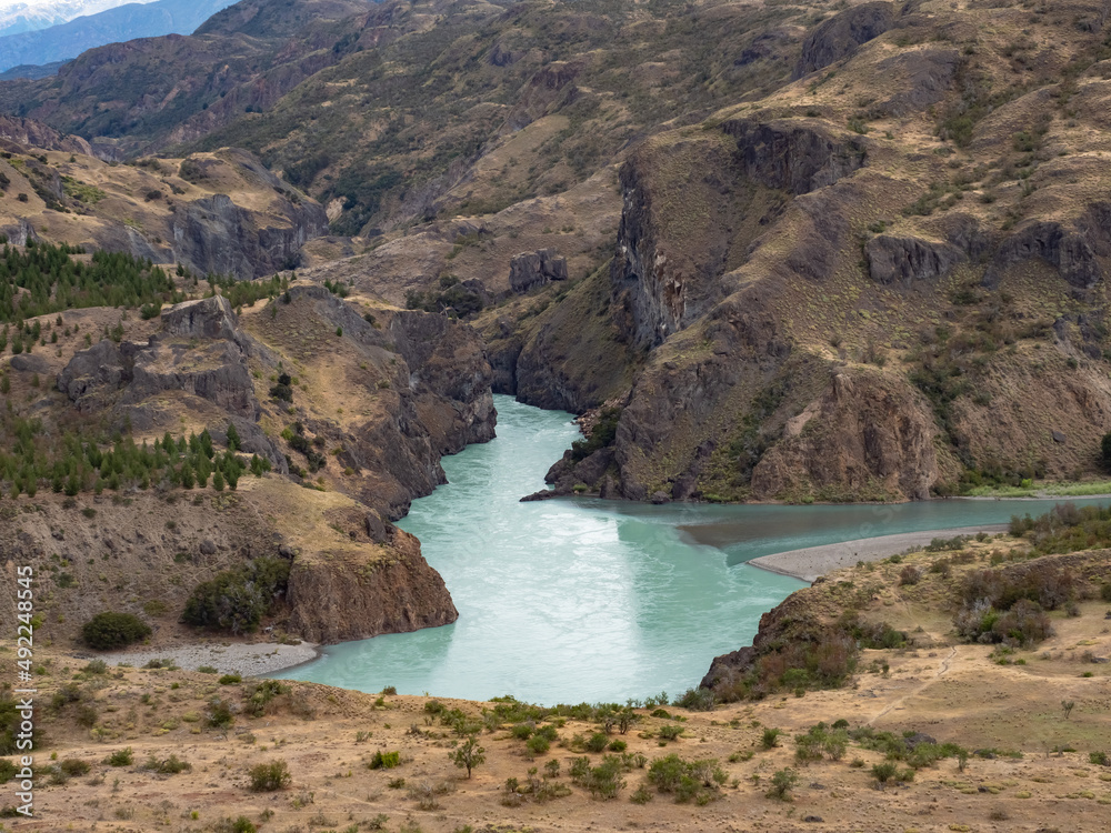 The confluence of the Baker river (with bright turquoise waters) with ...