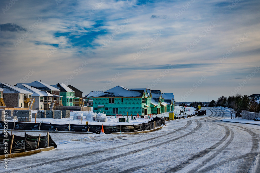 Unusually cold weather and late snowfall stoped construction ...