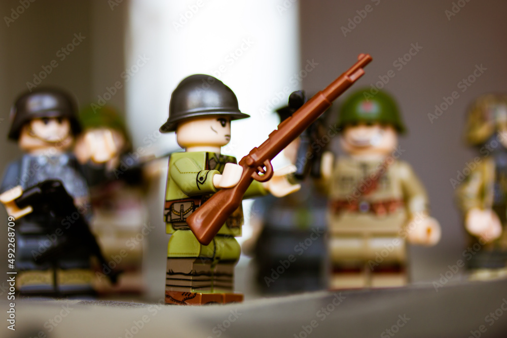 Kyiv, Ukraine. March 9, 2022. Military man with machine gun. LEGO ...