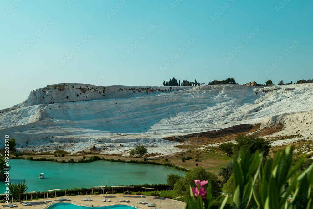 Natural travertine pools and terraces in Pamukkale. Cotton castle in ...