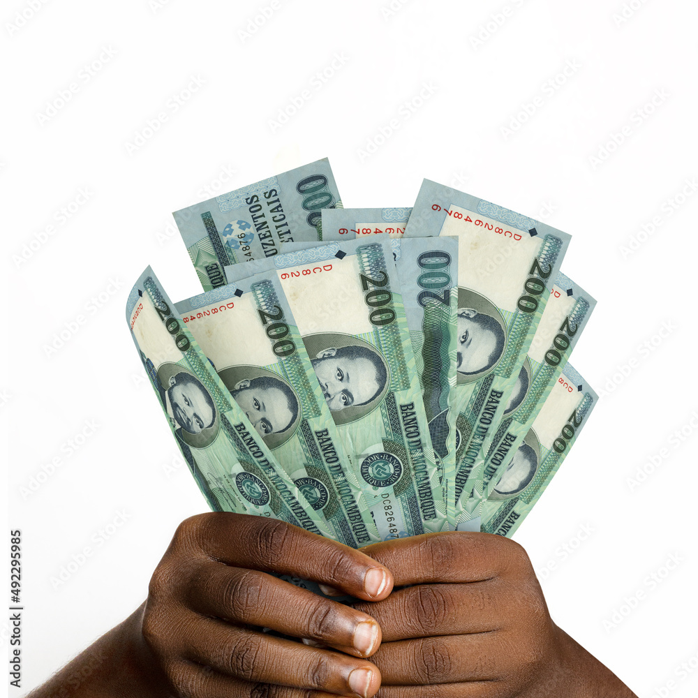 Black hands holding 3D rendered 200 Mozambican metical notes. closeup ...