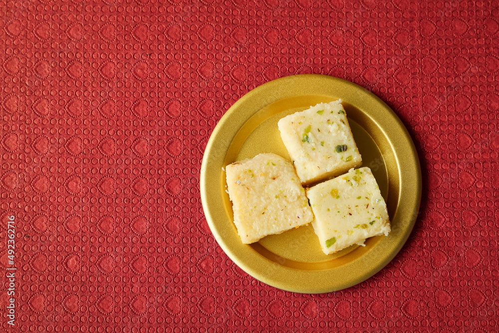 Diwali sweets pista barfi barfee Motichoor Laddu peda badam pak Indian ...