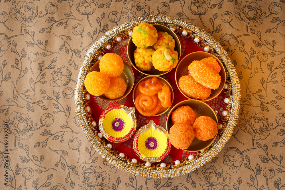 Diwali sweets pista barfi barfee Motichoor Laddu peda badam pak Indian ...