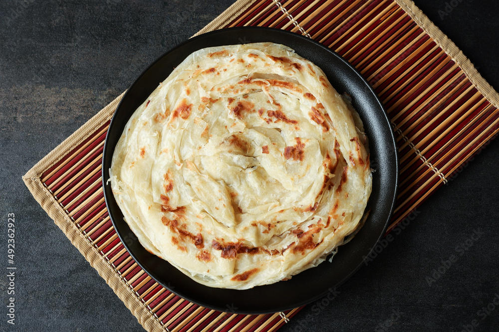 Kerala parathas / porotta / roti / parotta / barotta/ naan layered ...