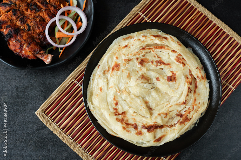 Kerala parathas / porotta / roti / parotta / barotta/ naan layered ...