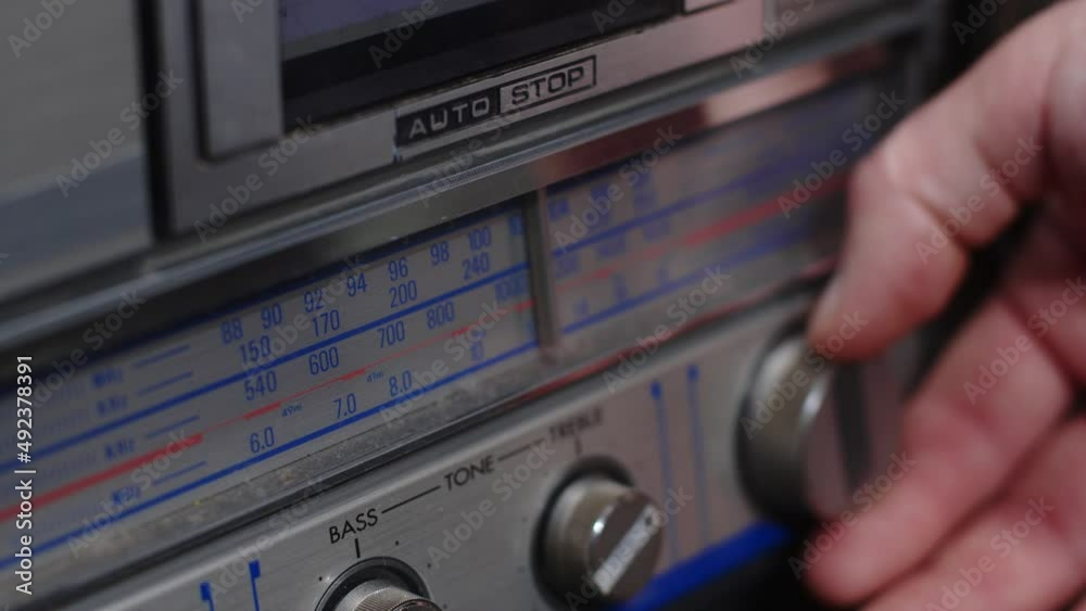 Fashion of the 90s. Vintage tape recorder from the 90s. Tuning analog ...