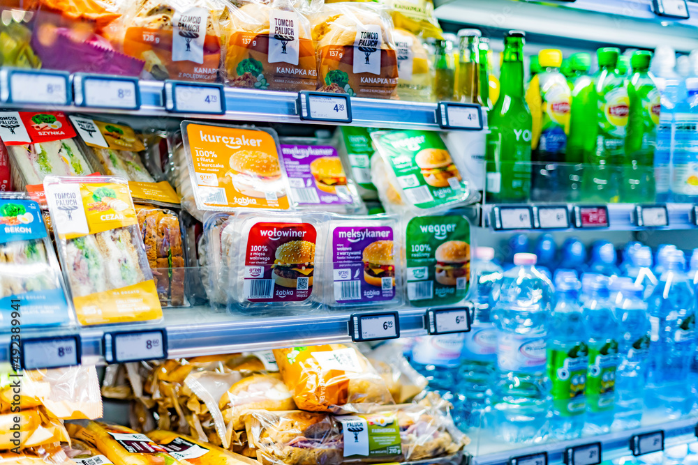 Pre-packaged foods displayed in a commercial refrigerator Stock Photo ...