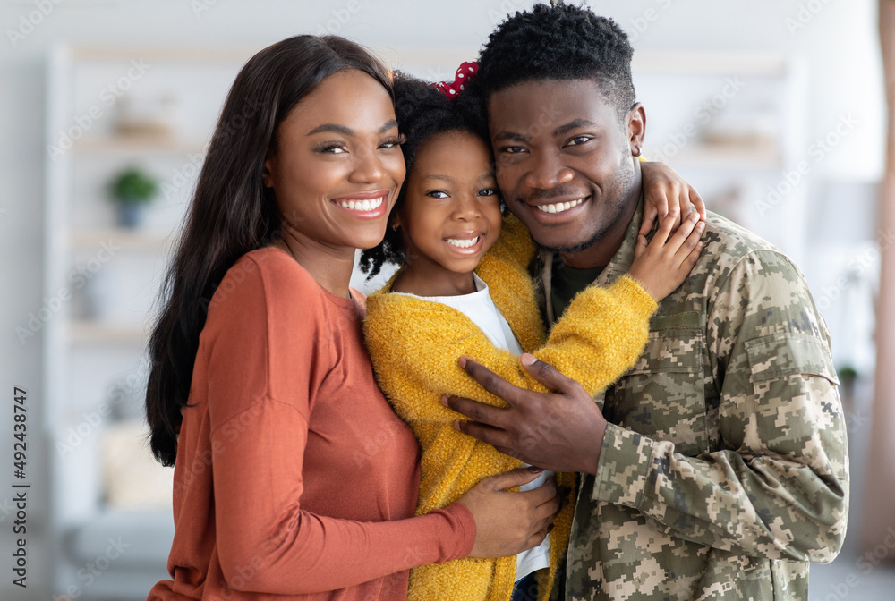 Military Family. Portrait Of African American Male Soldier With Wife ...
