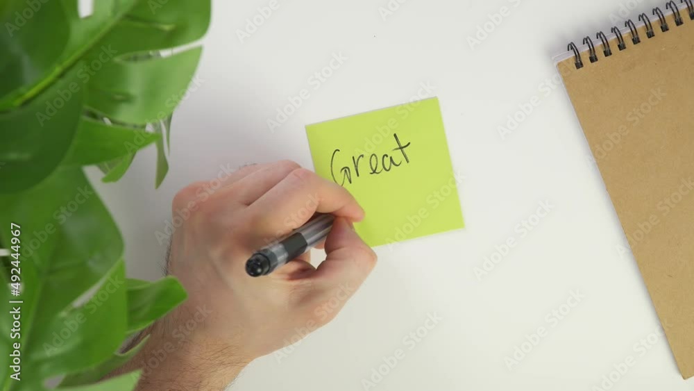 Great job write on paper. Top view write with a pen on a sticker. Put a ...