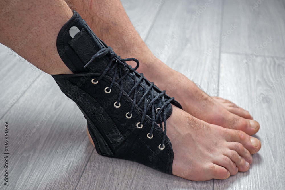 compression fixed in ankle stabilizer medical bandage. Fracture or Leg ...