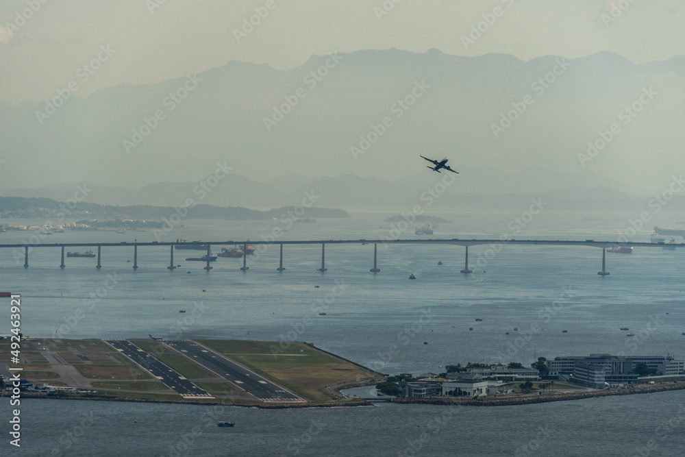 Airplane taking off from the airport runway in Rio de Janeiro, Brazil ...