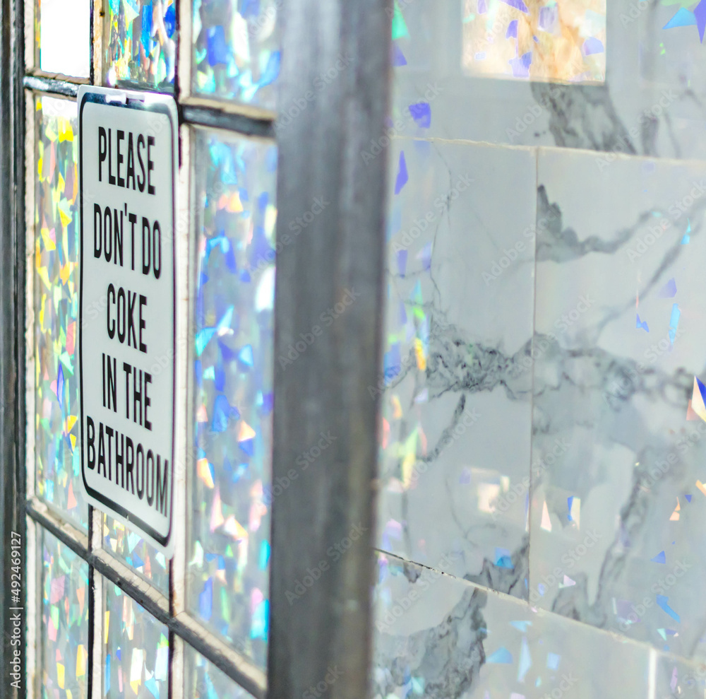 No coke in the bathroom sign, on a stylish bathroom door in natural ...
