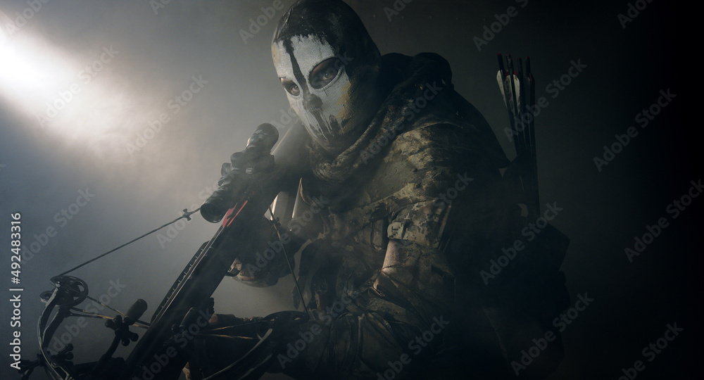 Fighter with a crossbow. Apocalypse Stock Photo | Adobe Stock