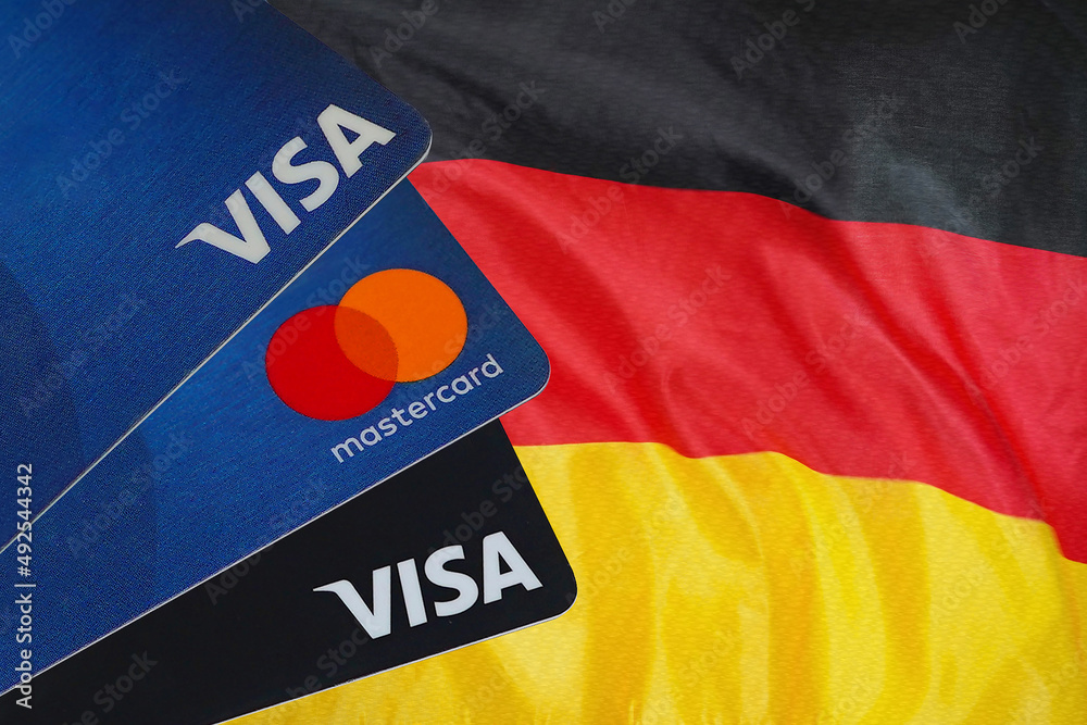 Visa Card, Mastercard, debit cards on German flag background. 10 March ...