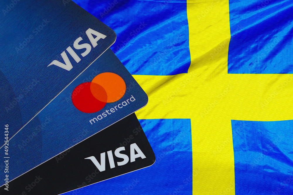 Visa Card, Mastercard, debit cards on Sweden flag background. 10 March ...