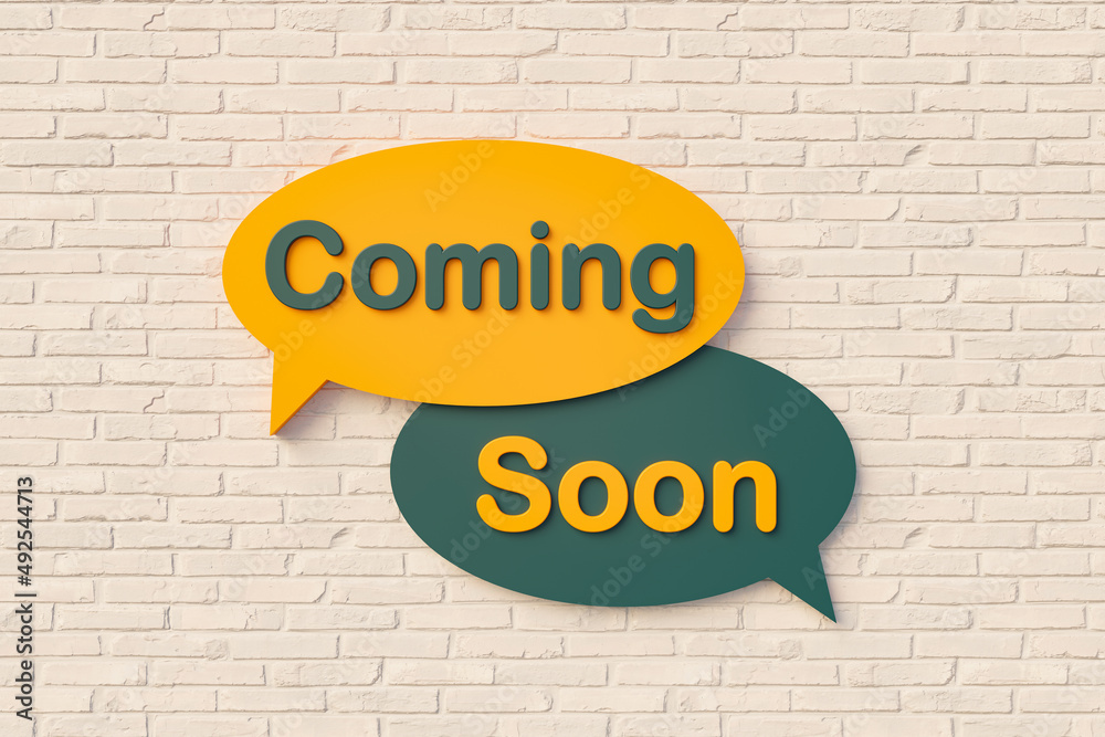 Coming soon. Sign, speech bubble, text in yellow and dark green against ...