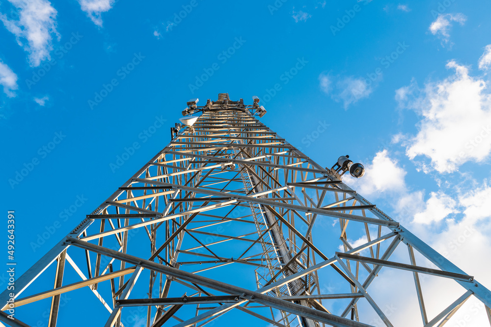 Vertical view of a communications tower showing installed multi ...