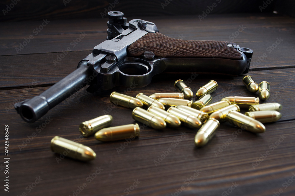 Historic Luger P08 Parabellum handgun, old soviet TT handgun and shiny ...