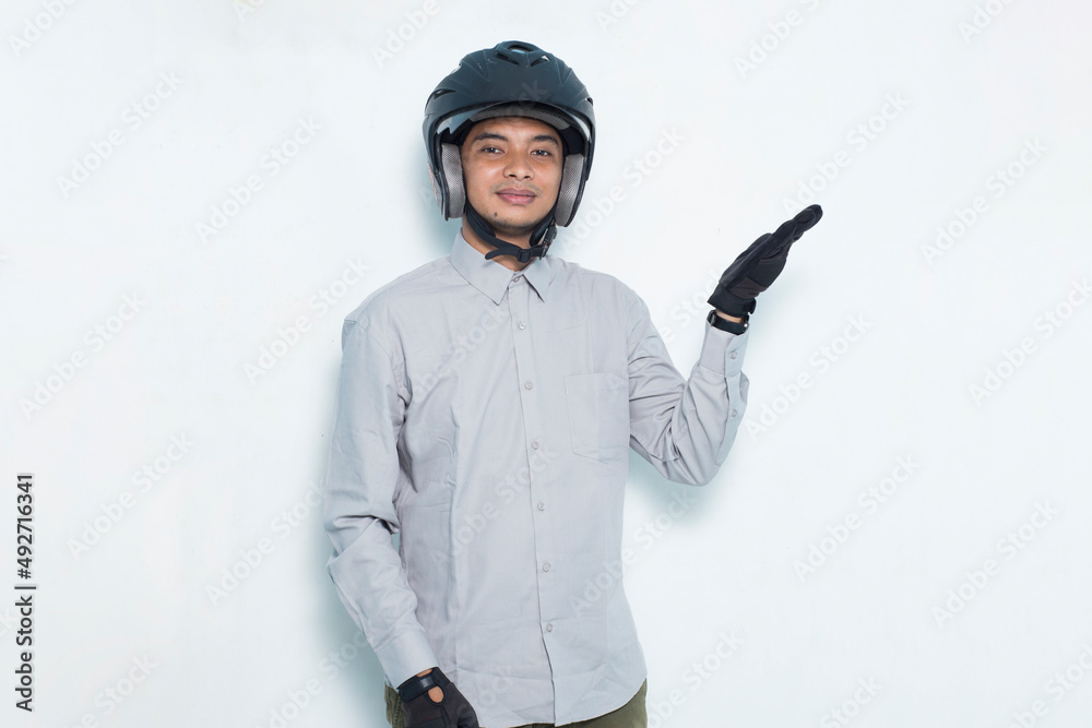 handsome asian man with a motorcycle helmet showing a thumbs up ok ...