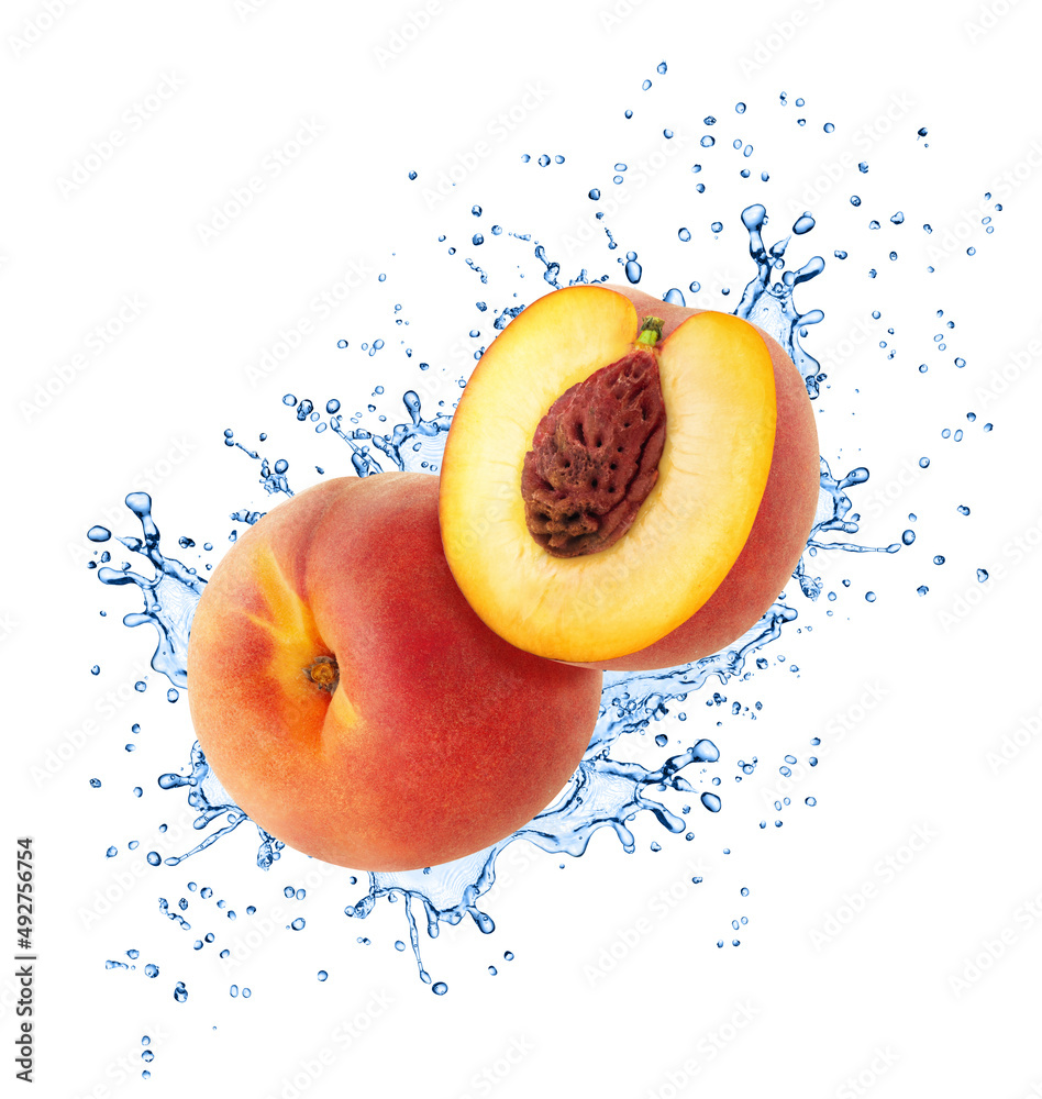Whole and halved peaches in water splash with full depth of field ...