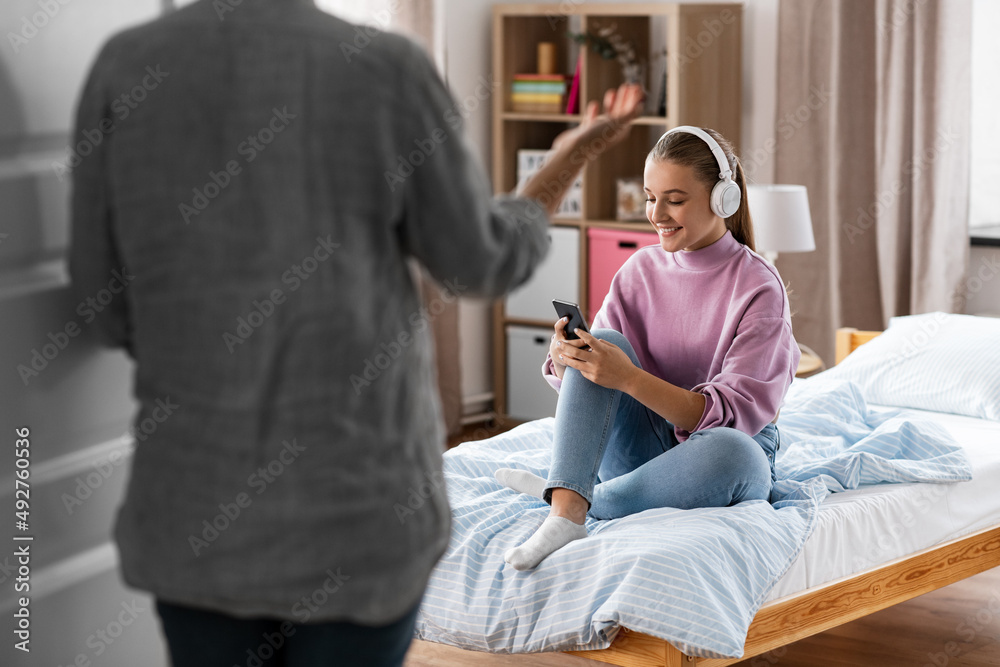 misbehavior, conflict and family concept - angry mother entering room ...