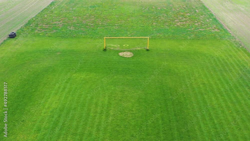White gate on a football field. Green background of a stadium. Soccer ...