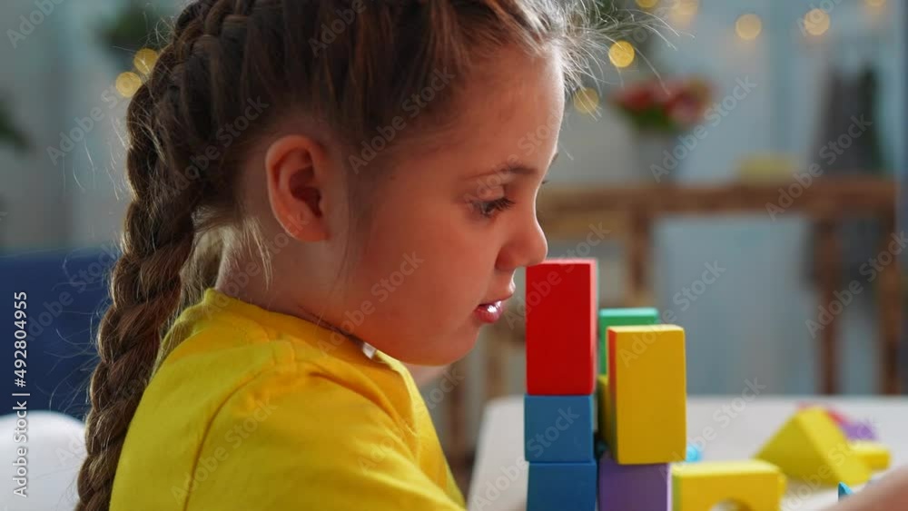 child play with cubes a toys blocks. childhood kindergarten kid happy ...