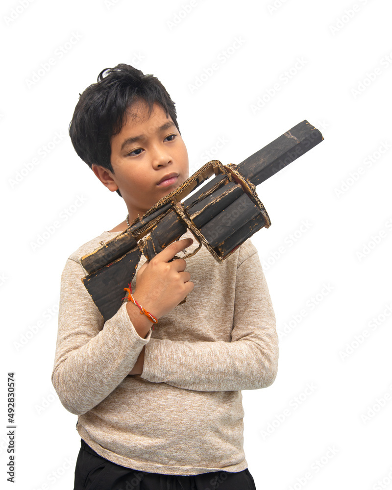 Asian boy holding a gun made of Corrugated Cardboard. Stock Photo ...