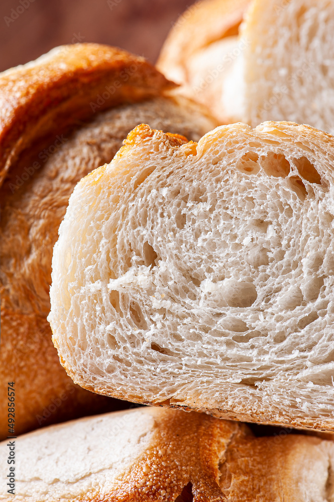 French bread cut in half showing the inside. Close-up photo. Stock ...