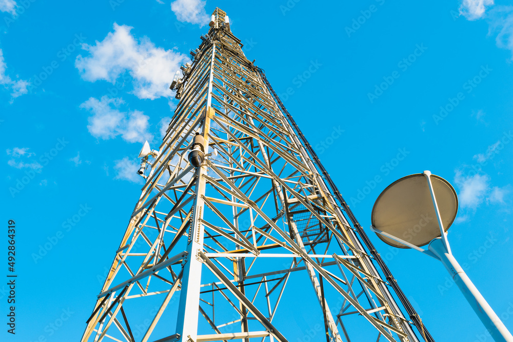 Vertical view of a communications tower showing installed multi ...