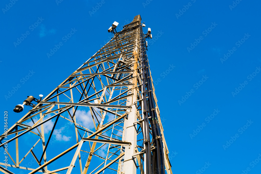 Vertical view of a communications tower showing installed multi ...